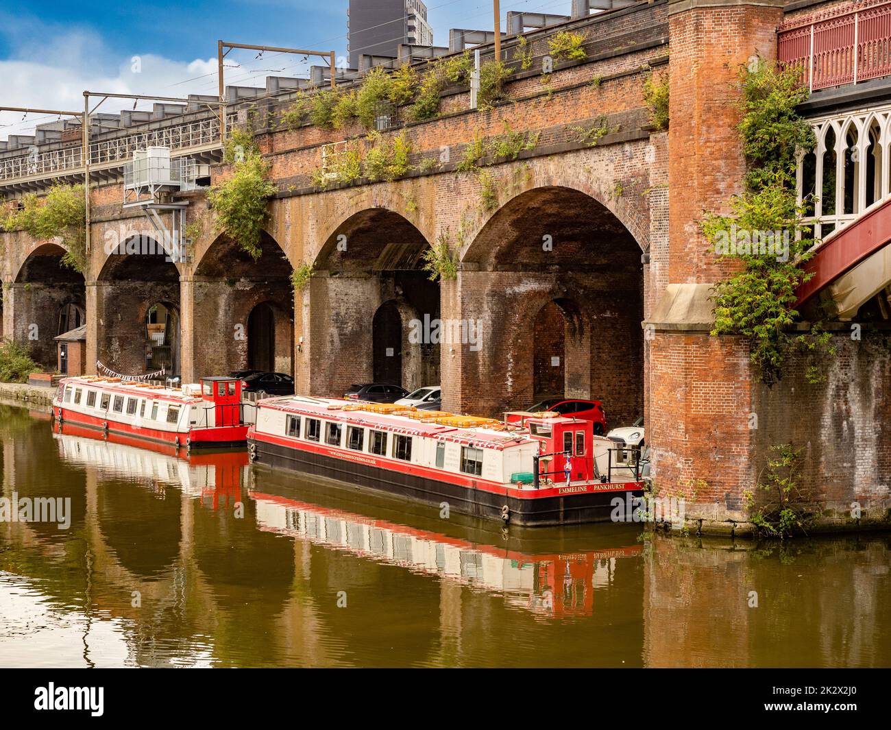 Canal cruise boats moored alongside the Bridgewater viaduct in the ...