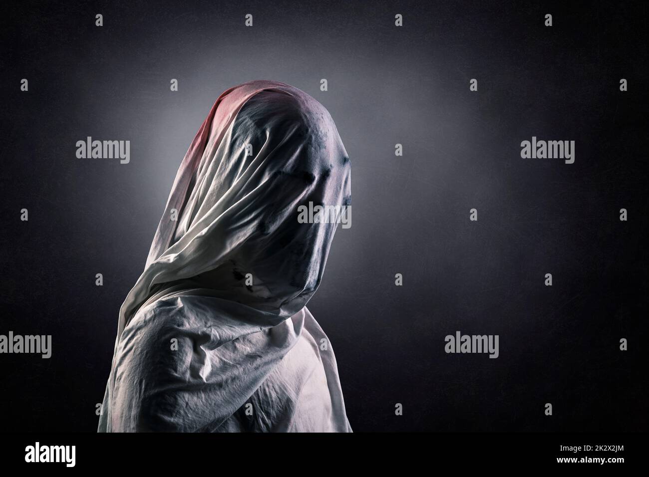 Portrait of a scary ghost over dark misty background Stock Photo - Alamy