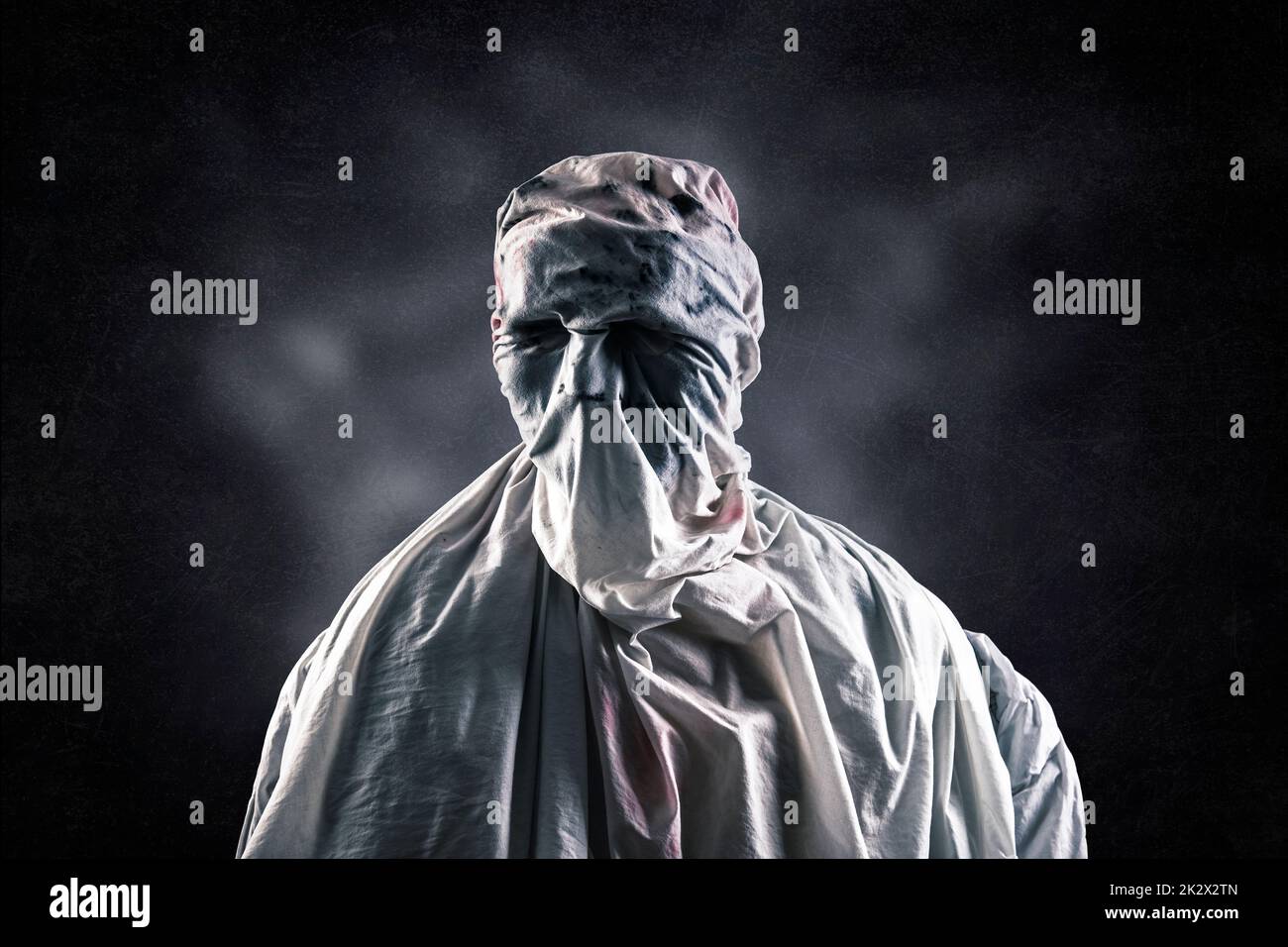 Portrait of a scary ghost over dark misty background Stock Photo - Alamy