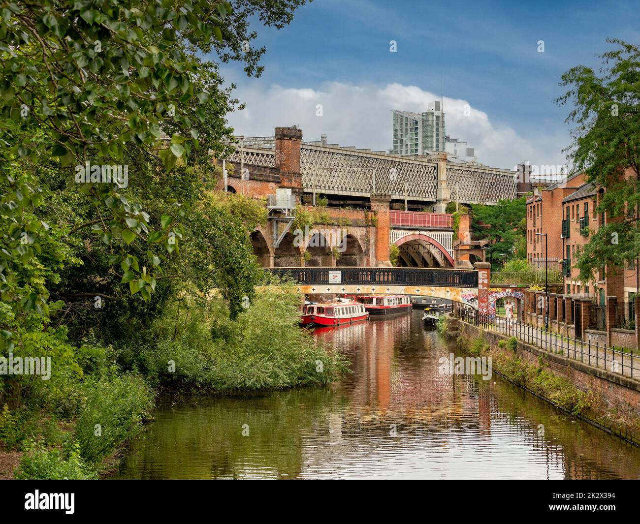 Footbridge spanning the Bridgewater canal with Castlefield and ...