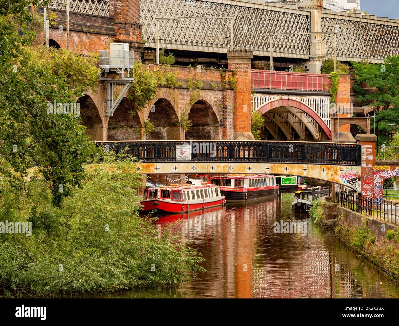 Foot bridge spanning the Bridgewater canal with Castlefield and ...