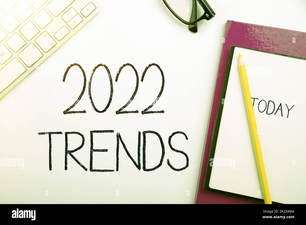 Hand writing sign 2022 Trends. Word for things that is famous for short ...