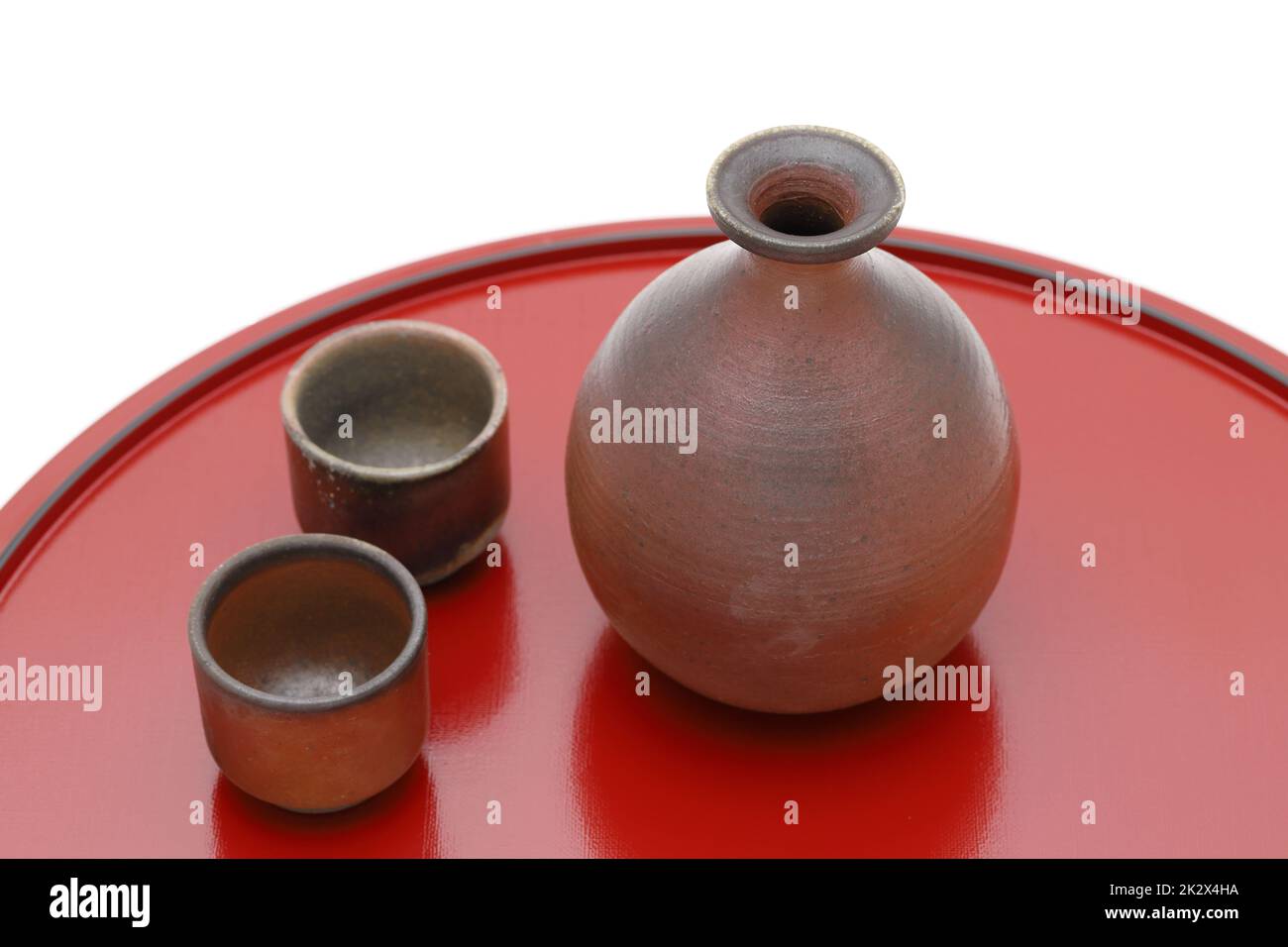 Japanese traditional sake bottle and cup on white background Stock ...