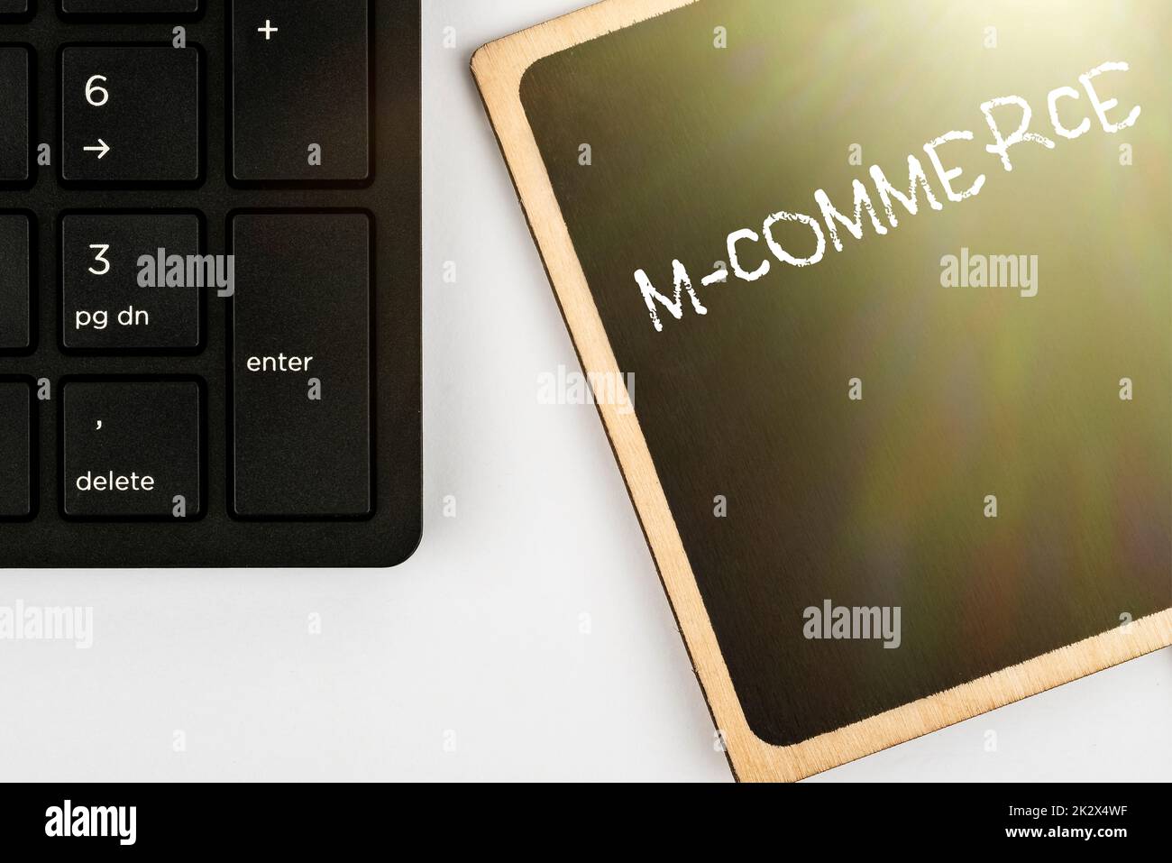 Sign displaying M Commerce. Concept meaning commercial transactions ...