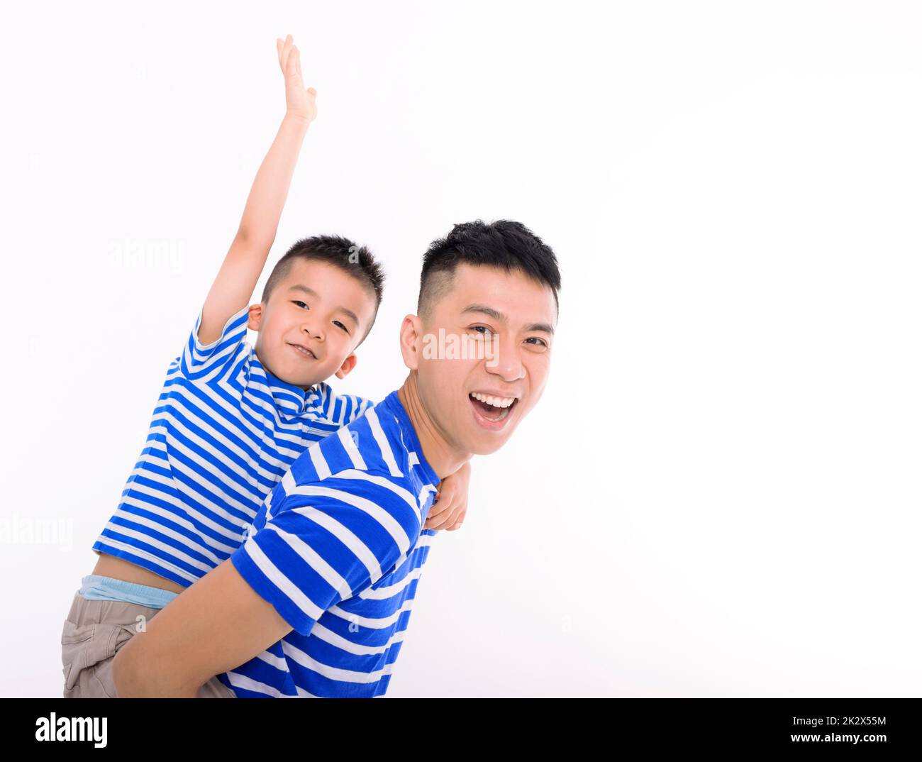 Father Carrying little boy Piggyback and Having Fun Stock Photo - Alamy