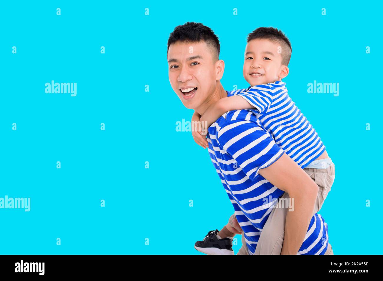 Father Carrying son Piggyback and Having Fun Stock Photo - Alamy
