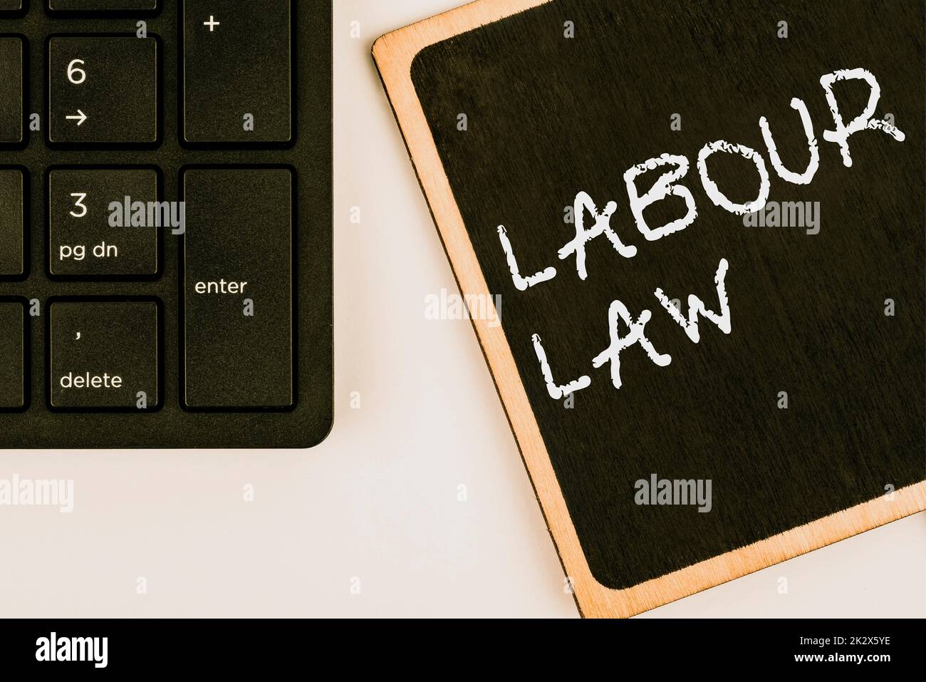 Handwriting text Labour Law. Business showcase Rules implemented by the ...