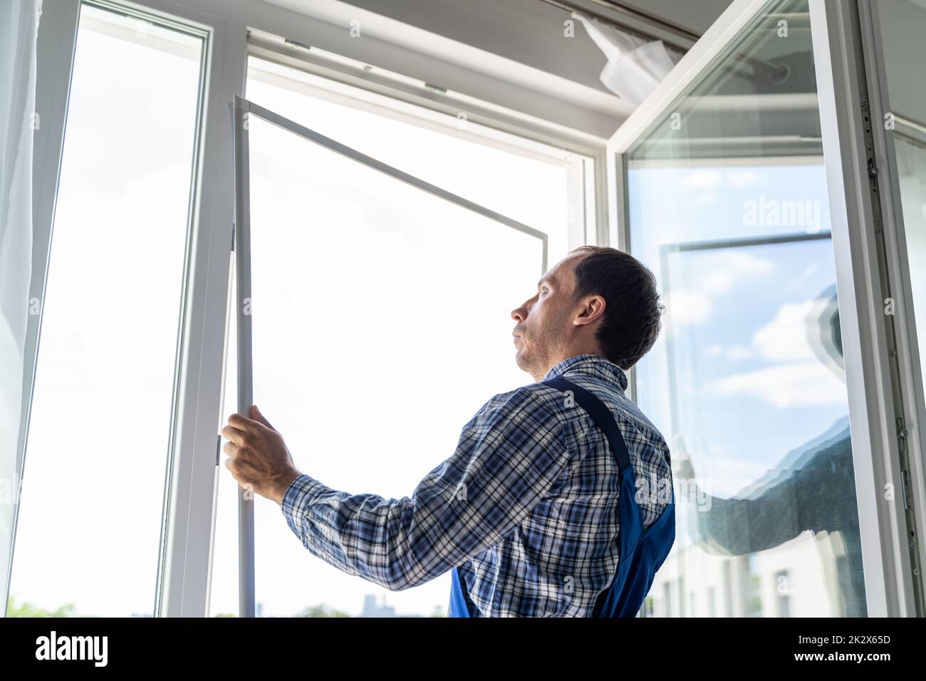 Mosquito Net Frame Install Service Stock Photo - Alamy