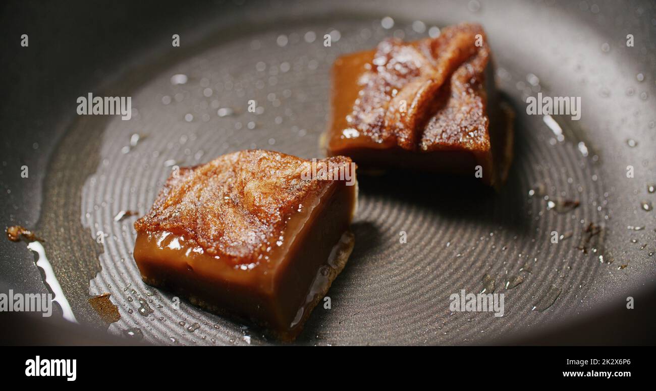 Grill chinese sticky rice cake Stock Photo - Alamy