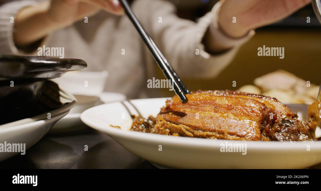 Braised pork preserved vegetable soy sauce at restaurant Stock Photo ...