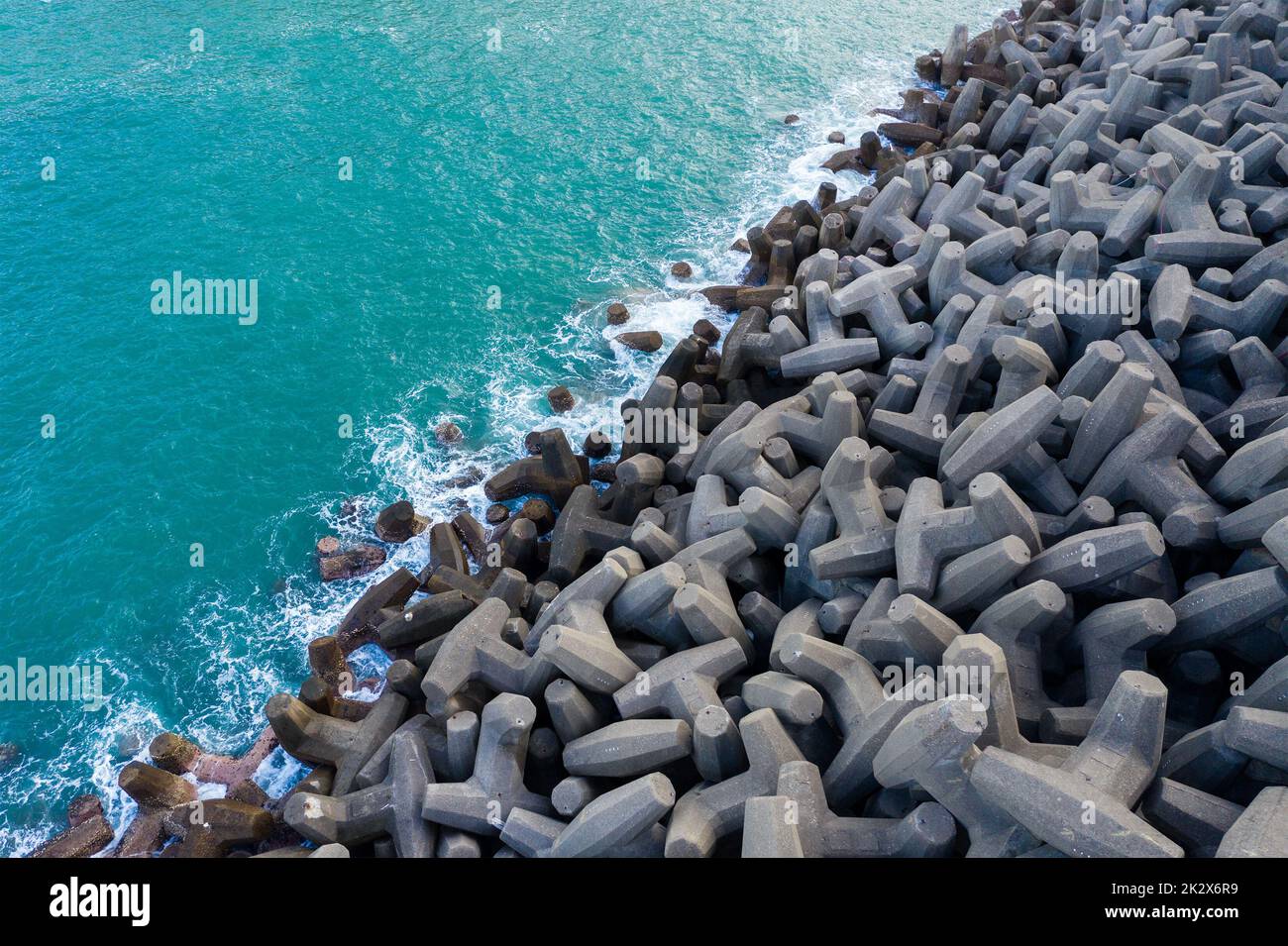 Top down view of the wave breaker over the sea Stock Photo - Alamy