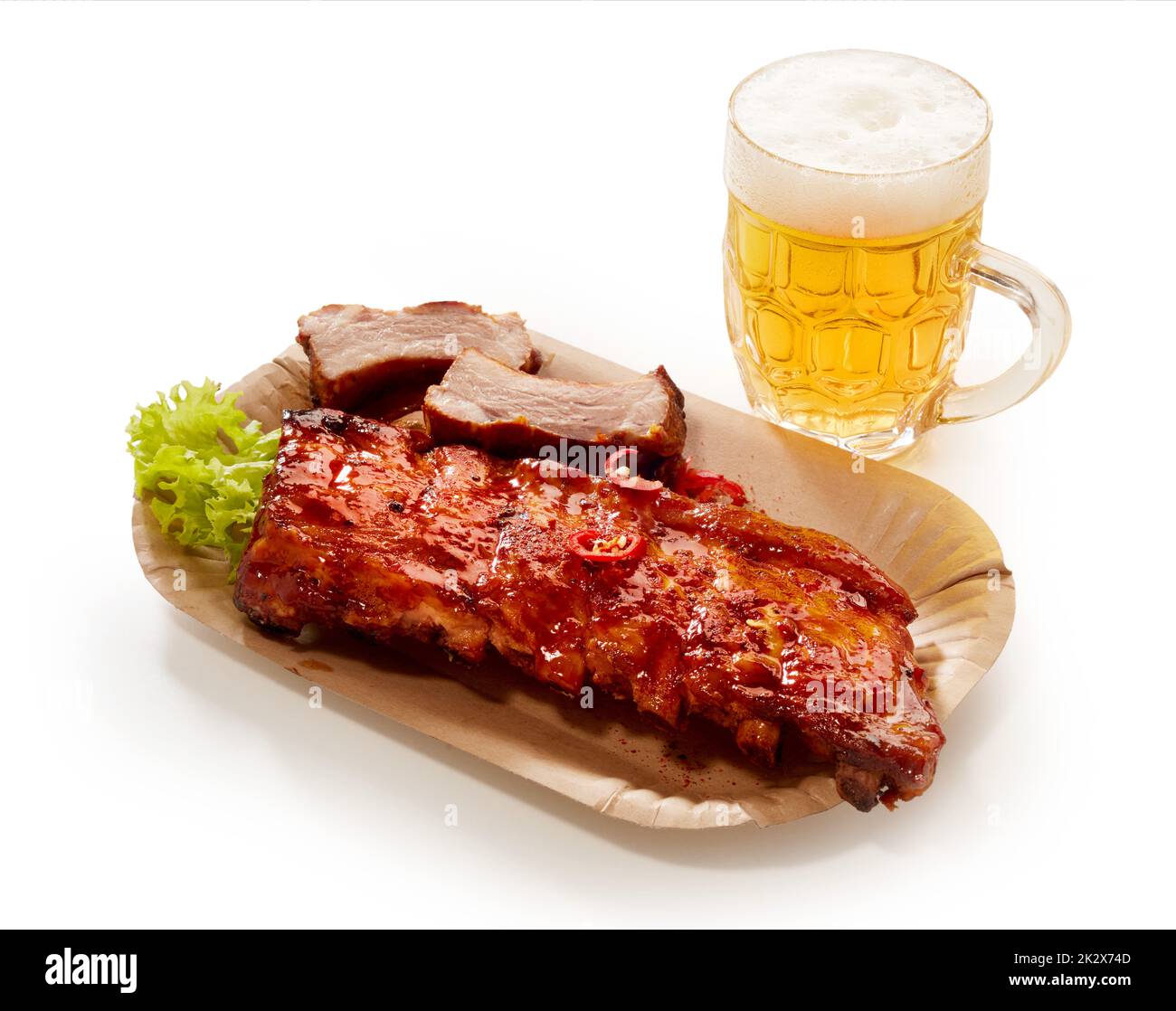 Beer and pork ribs on plate Stock Photo - Alamy