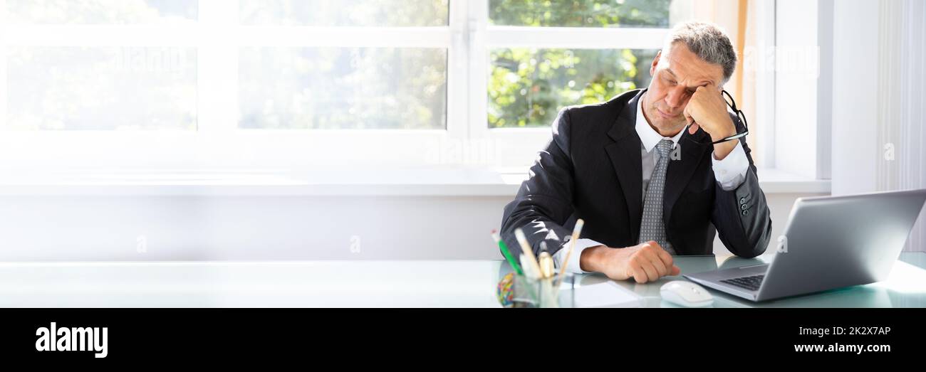 Businessman Sleeping In Office Stock Photo - Alamy