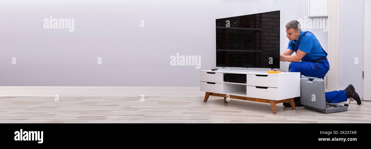 Old man television repairman hi-res stock photography and images - Alamy