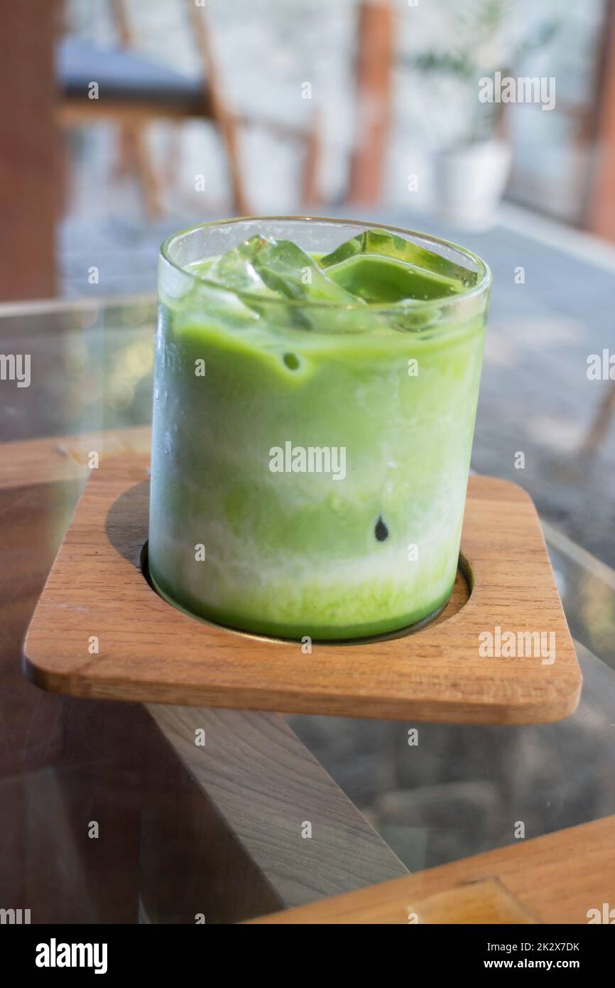 Iced milk matcha green tea drink Stock Photo - Alamy