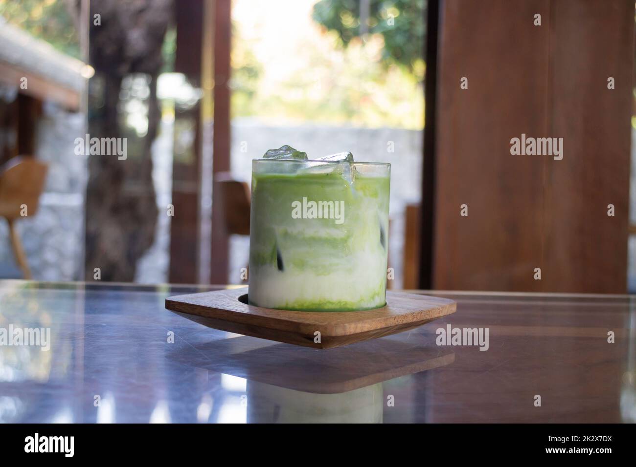 Iced milk matcha green tea drink Stock Photo - Alamy
