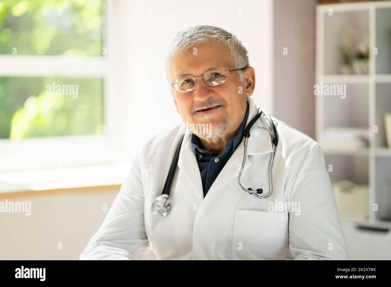 Portrait happy old doctor hi-res stock photography and images - Alamy