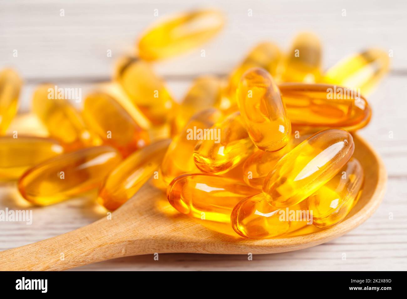 Fish oil or Cod liver oil gel in capsules with omega 3 vitamins ...