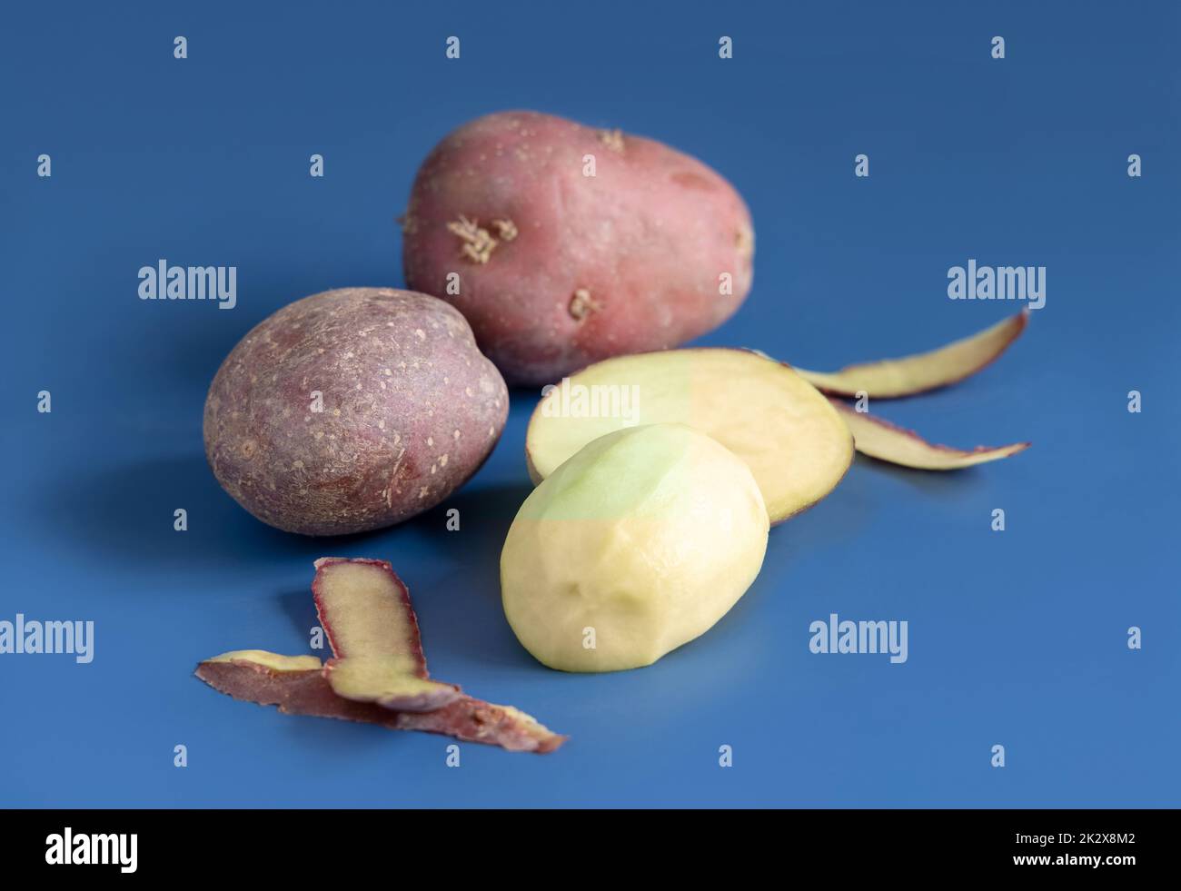 Raw peeled potatoes on hi-res stock photography and images - Alamy