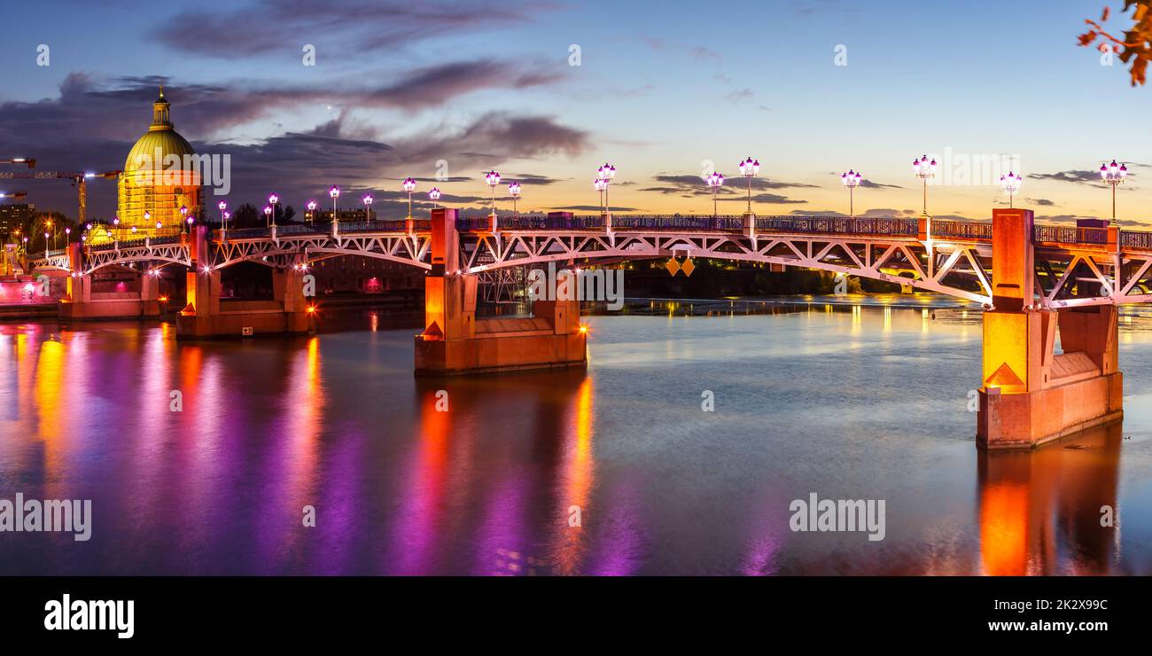 Toulouse Pont Saint-Pierre bridge with Garonne river at twilight ...