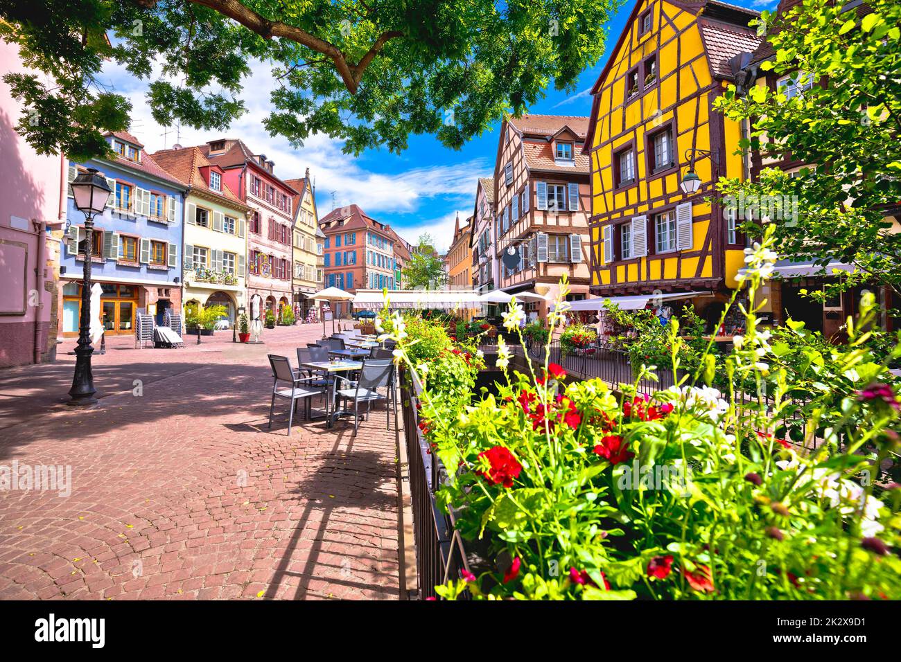 Colorful historic town of Colmar street architecture and flowers view ...