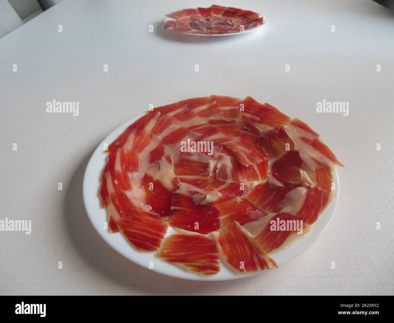 delicious Spanish Iberian ham cut with fantastic aromatic tasty knife ...