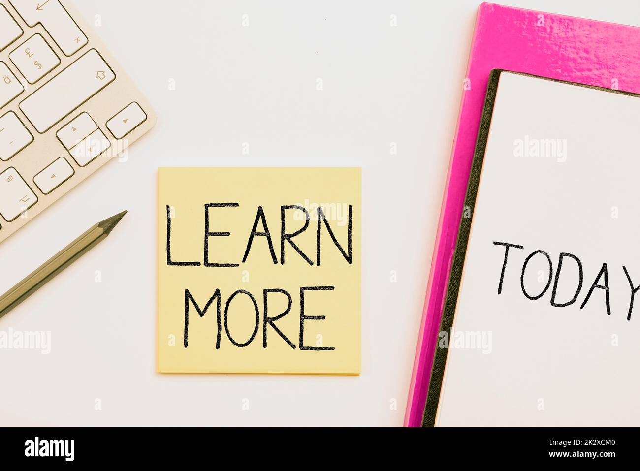 Text showing inspiration Learn More. Word Written on Deepen knowledge of the thing you want to ...