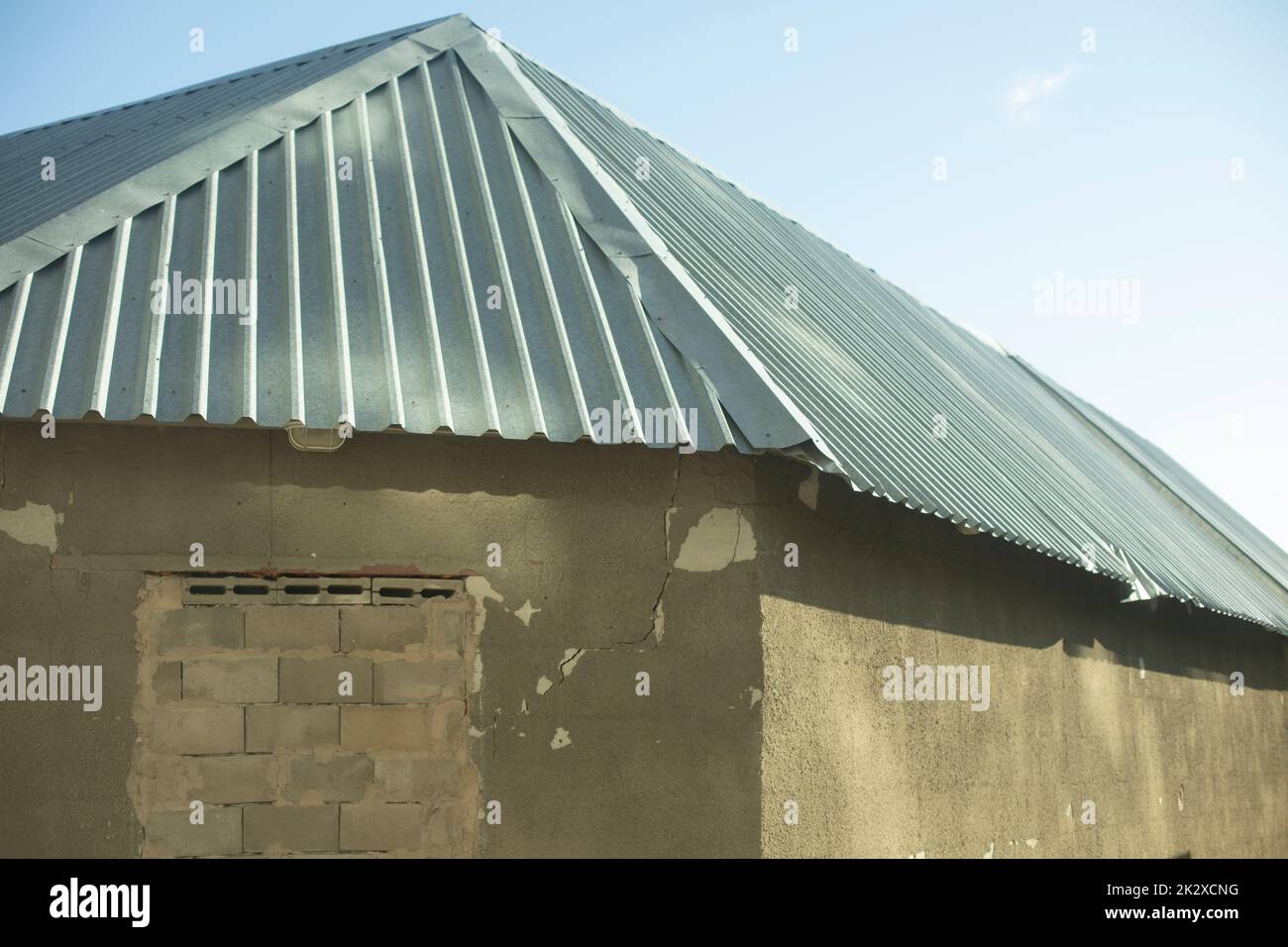 Stainless steel roof. Steel roof of house. Small building Stock Photo ...