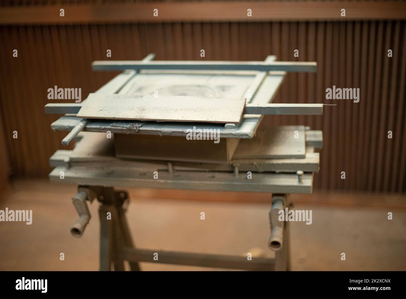 Table for painting parts. Table in workshop Stock Photo - Alamy