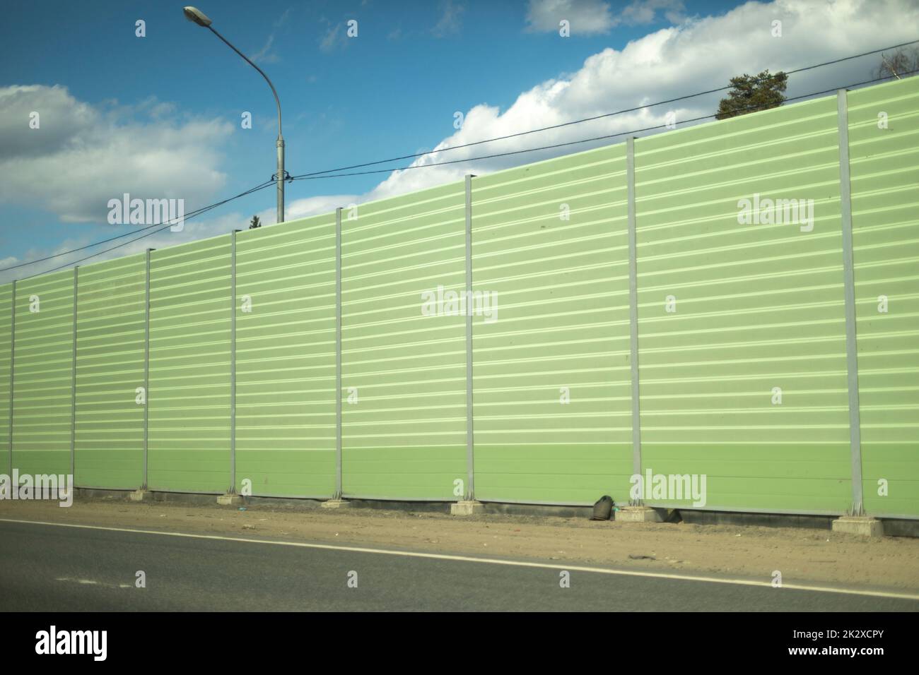 Fencing on highway. Details of route outside city Stock Photo - Alamy