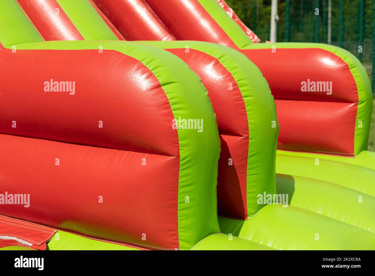 Red inflatable design. Inflatable slide Stock Photo - Alamy