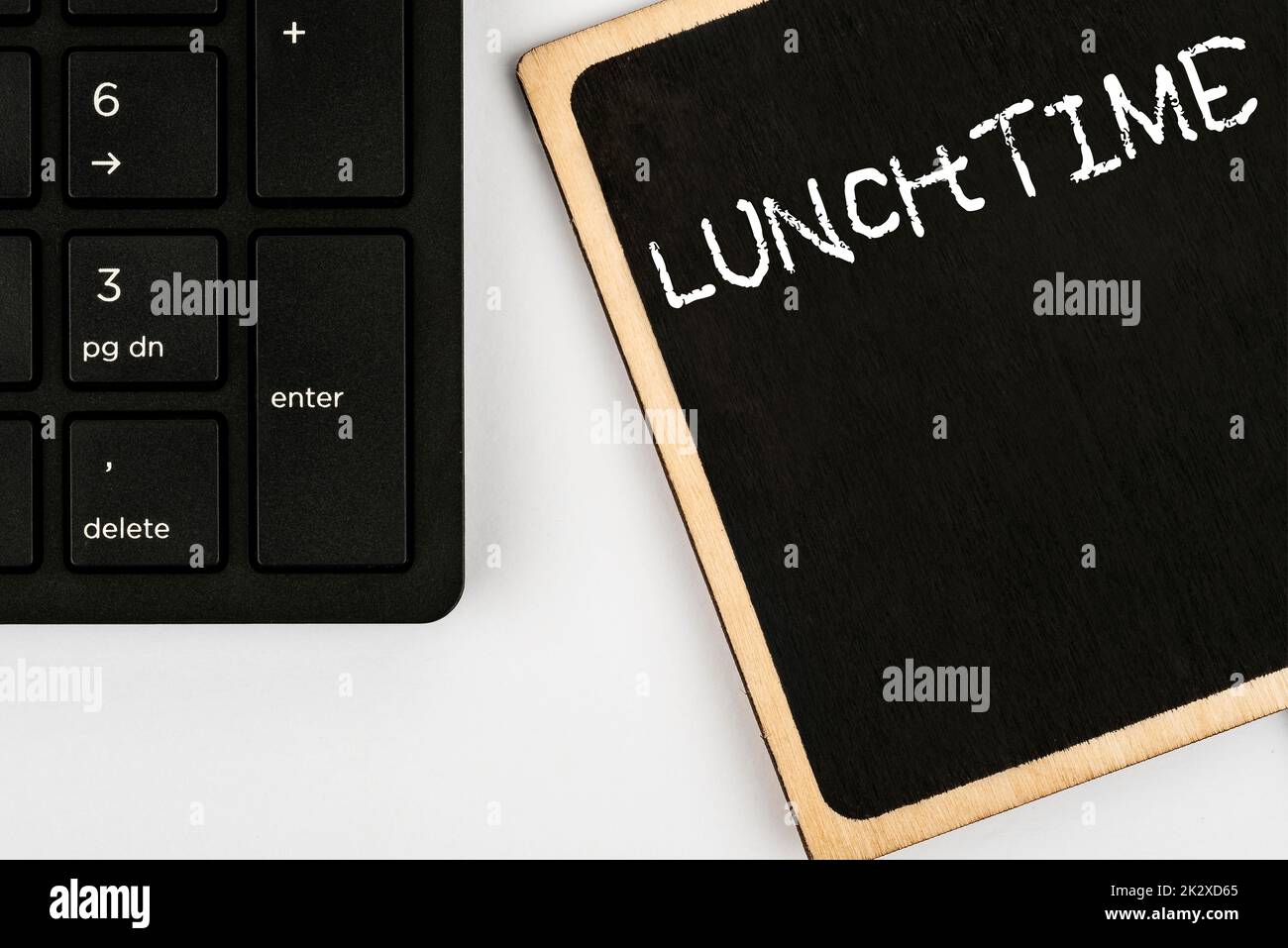 Hand writing sign Lunchtime. Conceptual photo Meal in the middle of the ...