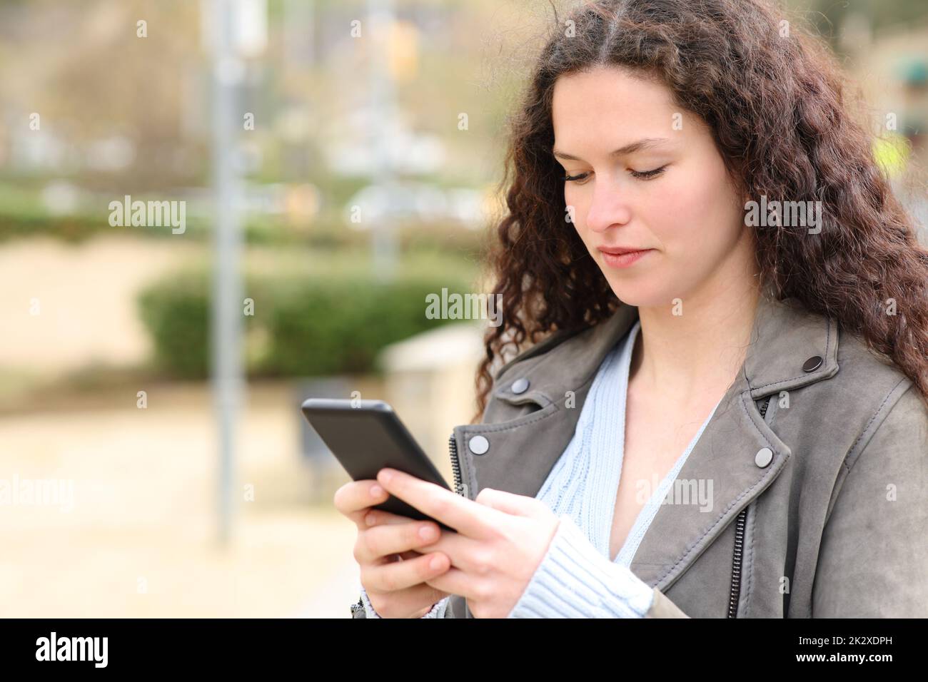 Person and texting adult serious street hi-res stock photography and ...