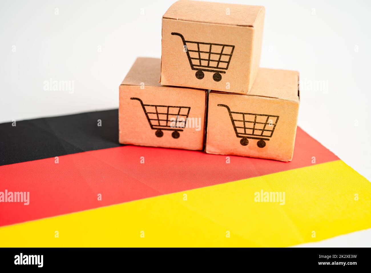 Box with shopping cart logo and Germany flag, Import Export Shopping ...