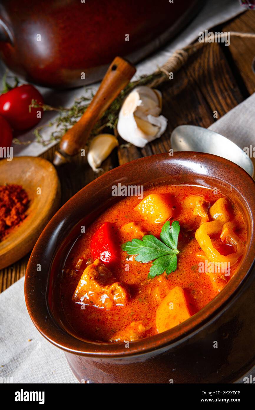 Hungarian goulash soup in a cauldron or pot Stock Photo - Alamy