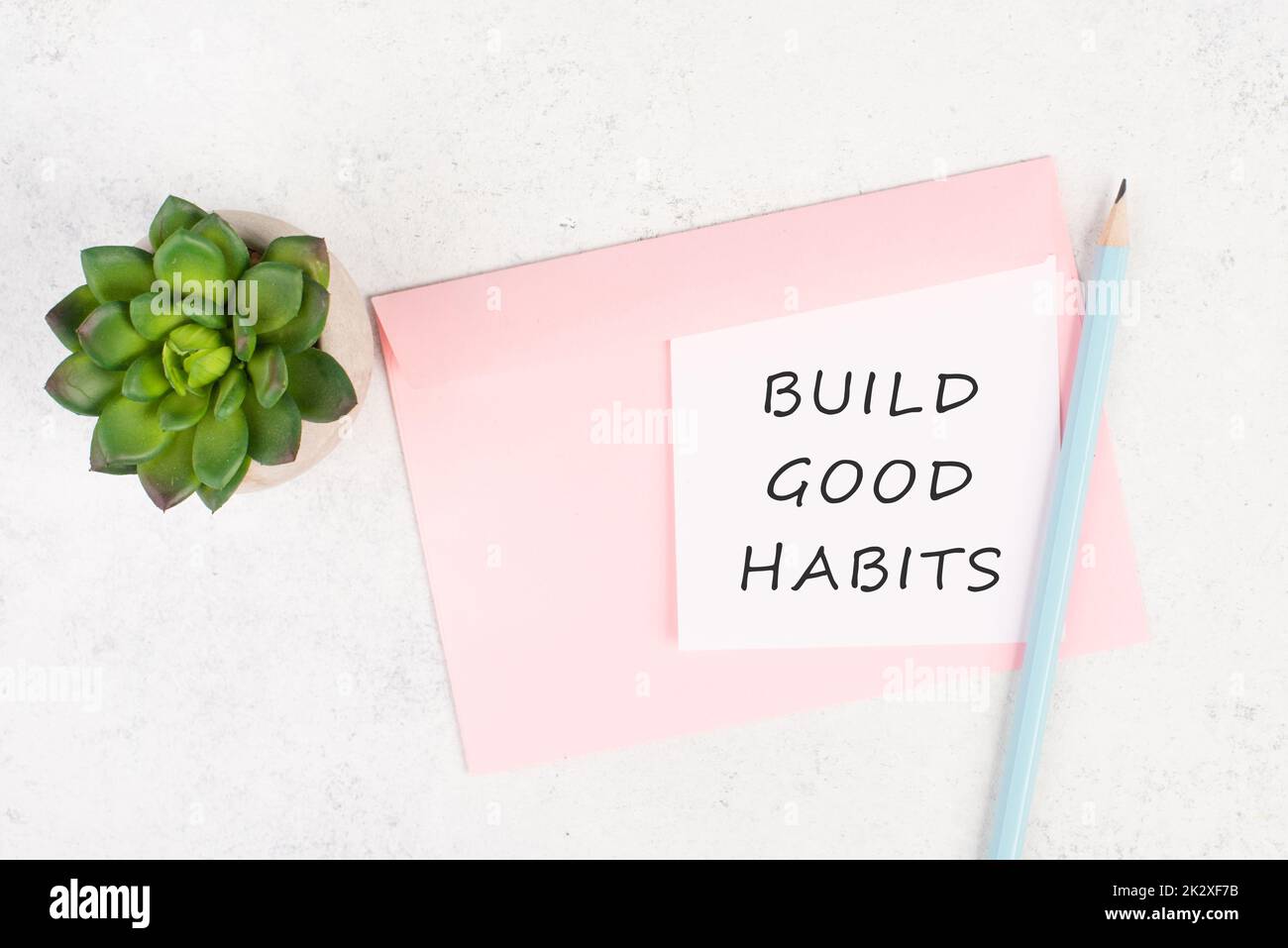 The words build good habits are standing on a paper, change lifestyle ...