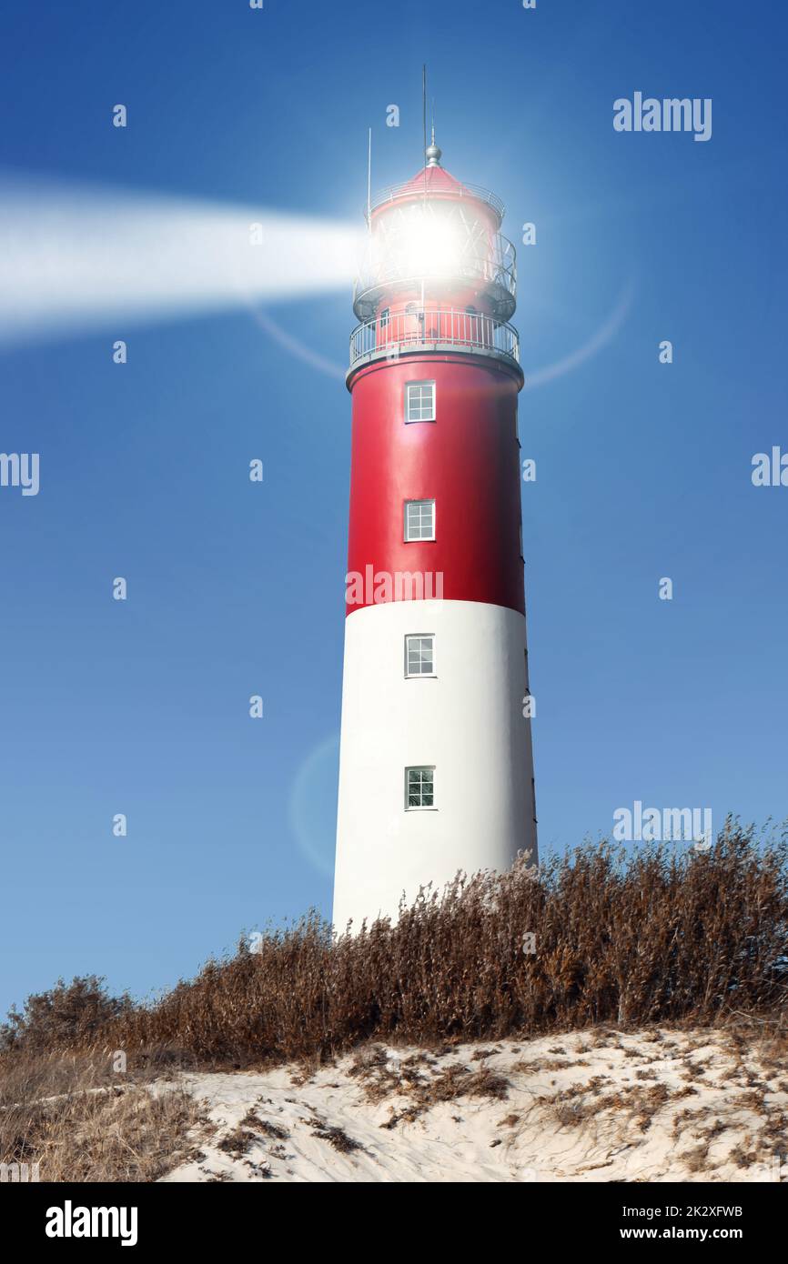 Old lighthouse searchlight beam through marine air Stock Photo - Alamy