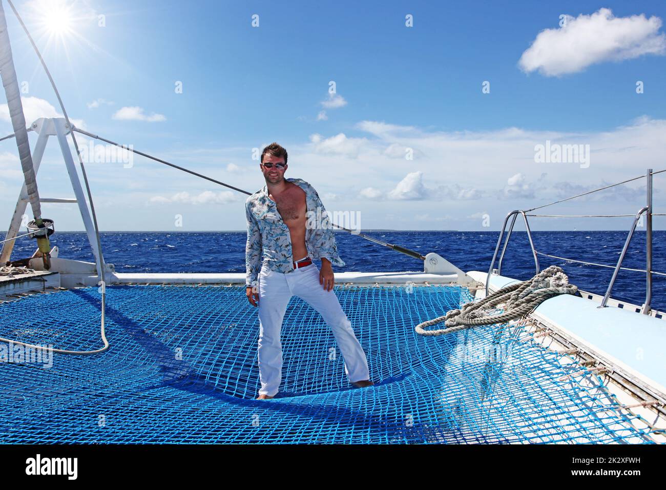 Man sailing boat hi-res stock photography and images - Alamy