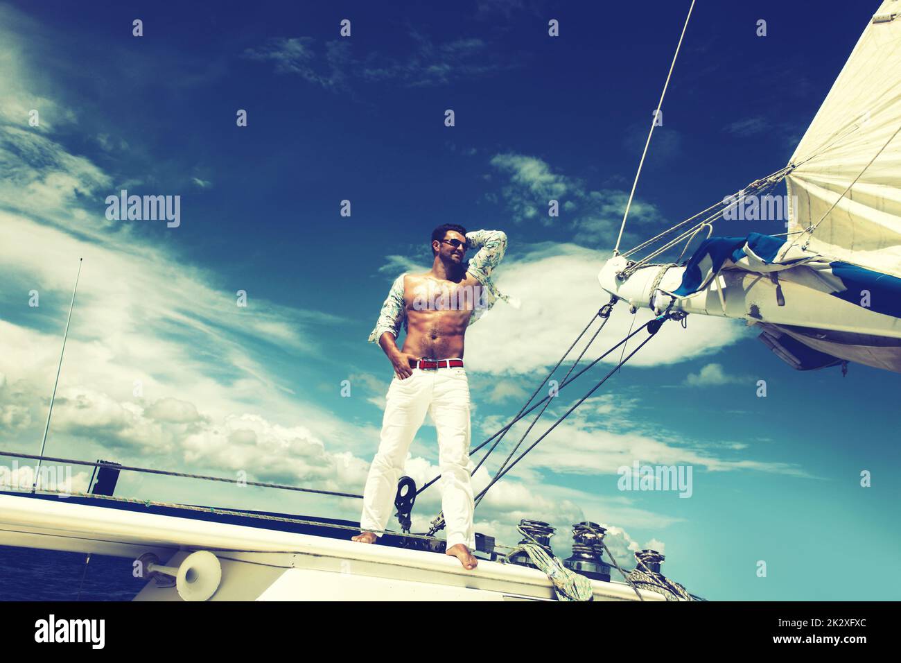 Man sailing boat hi-res stock photography and images - Alamy