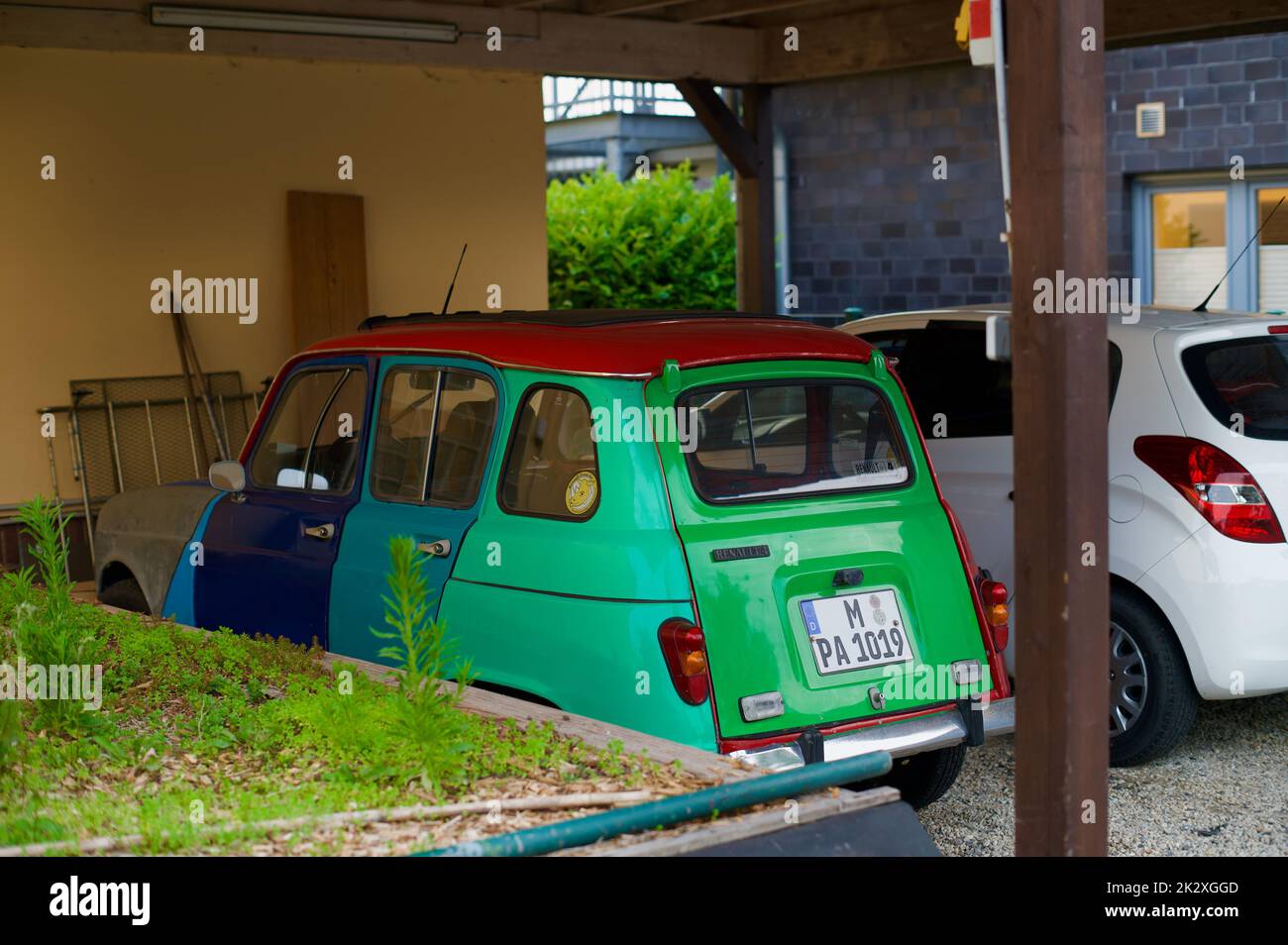 A parked Zaz car painted in various colors in KampLintfort Stock Photo ...