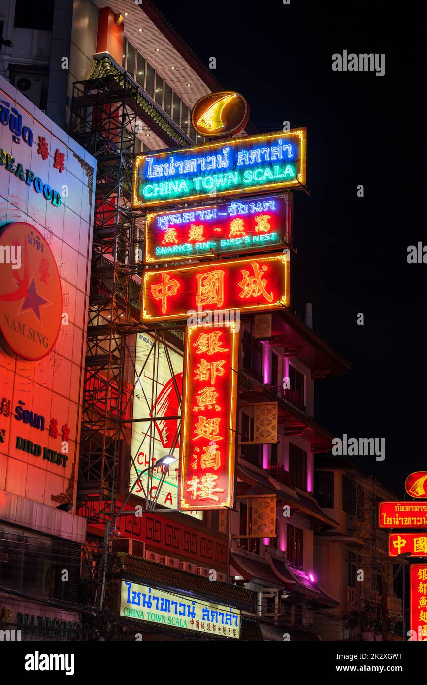 A vertical of colorful neon signs captured at night in Chinatown, Bangkok Stock Photo - Alamy