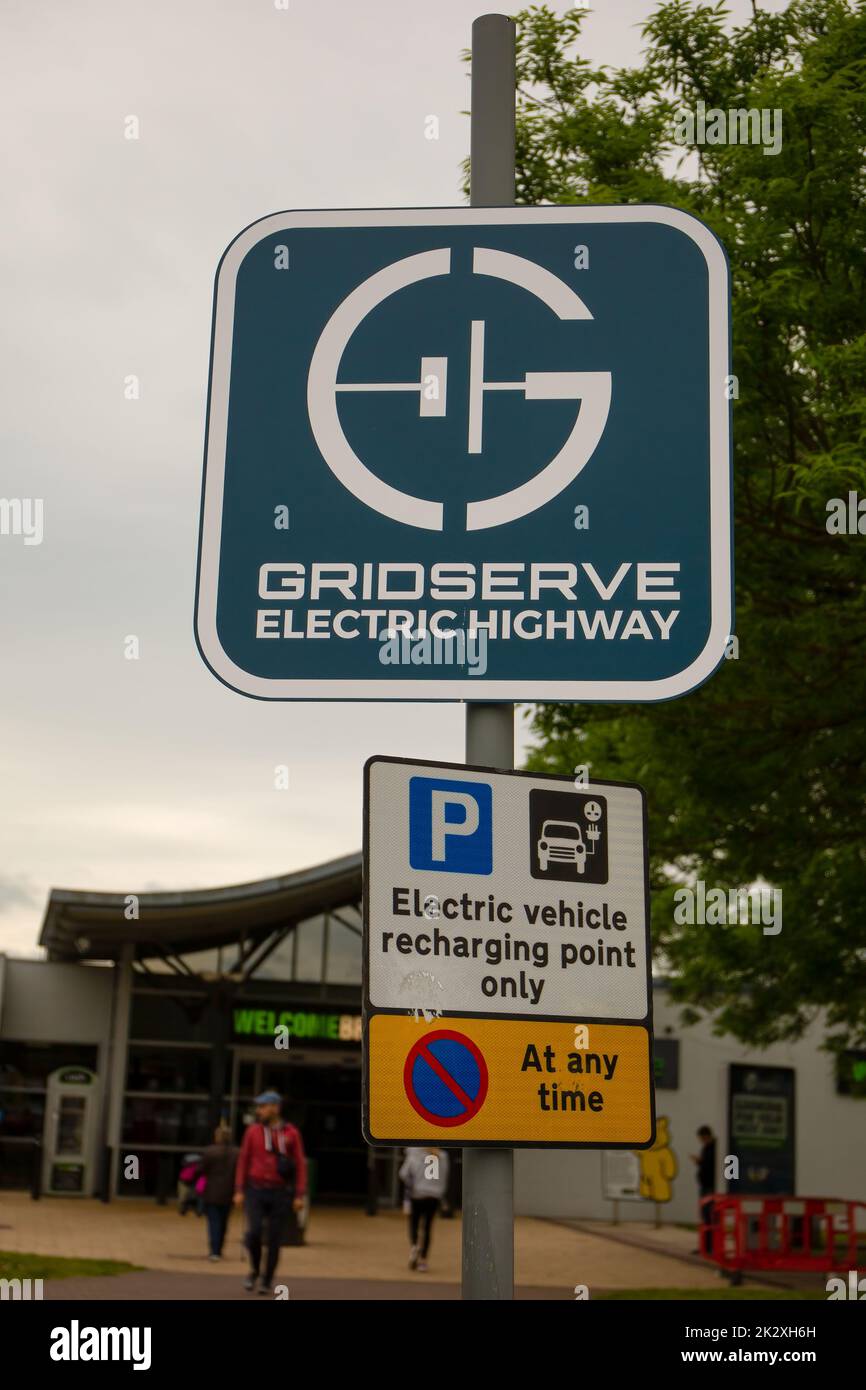 A vertical shot of a sign for electric vehicle recharging in Corley ...