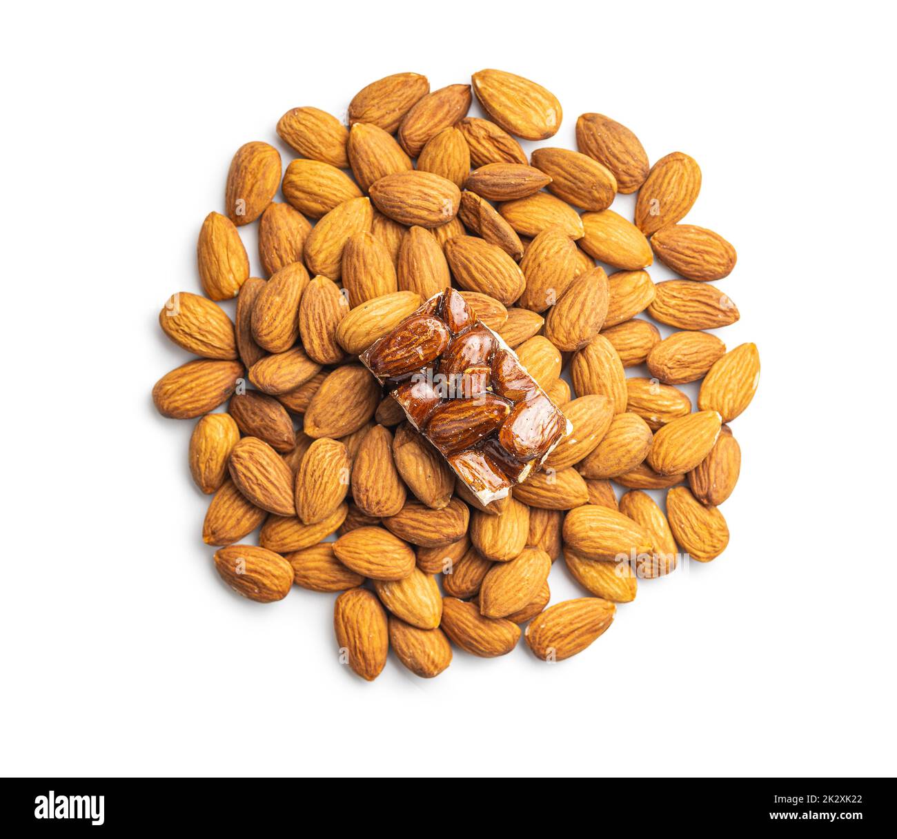 Almond nuts and sweet mini almond bar isolated on white background ...
