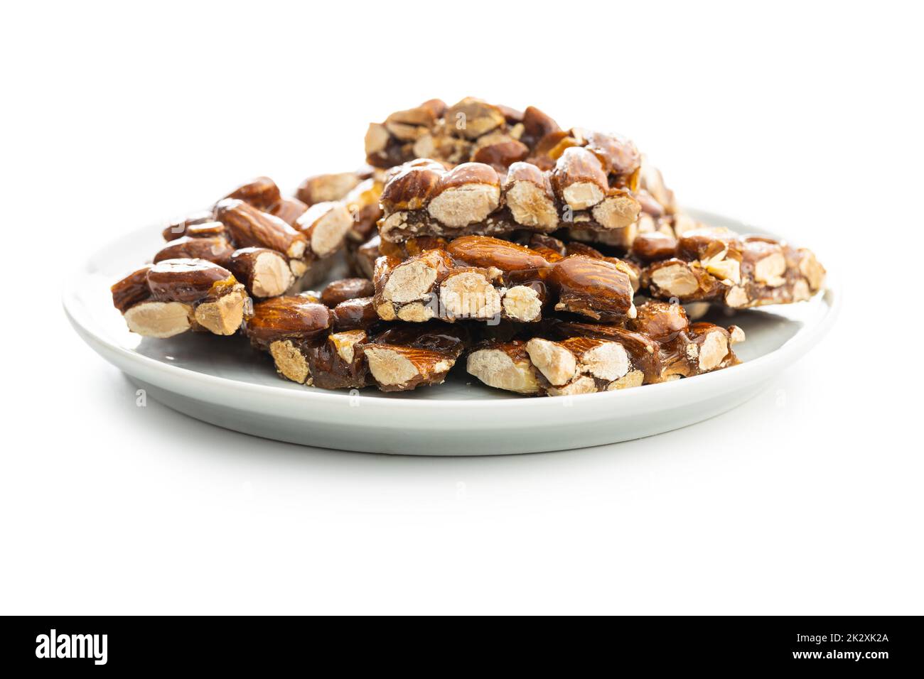 Sweet mini almond bars isolated on white background Stock Photo - Alamy