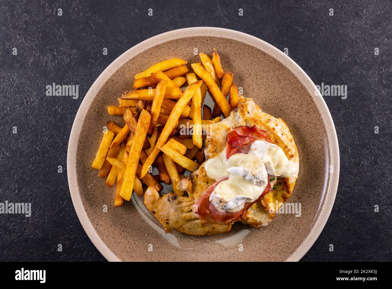 typical czech cuisine chicken slice baked with ham and camembert with ...