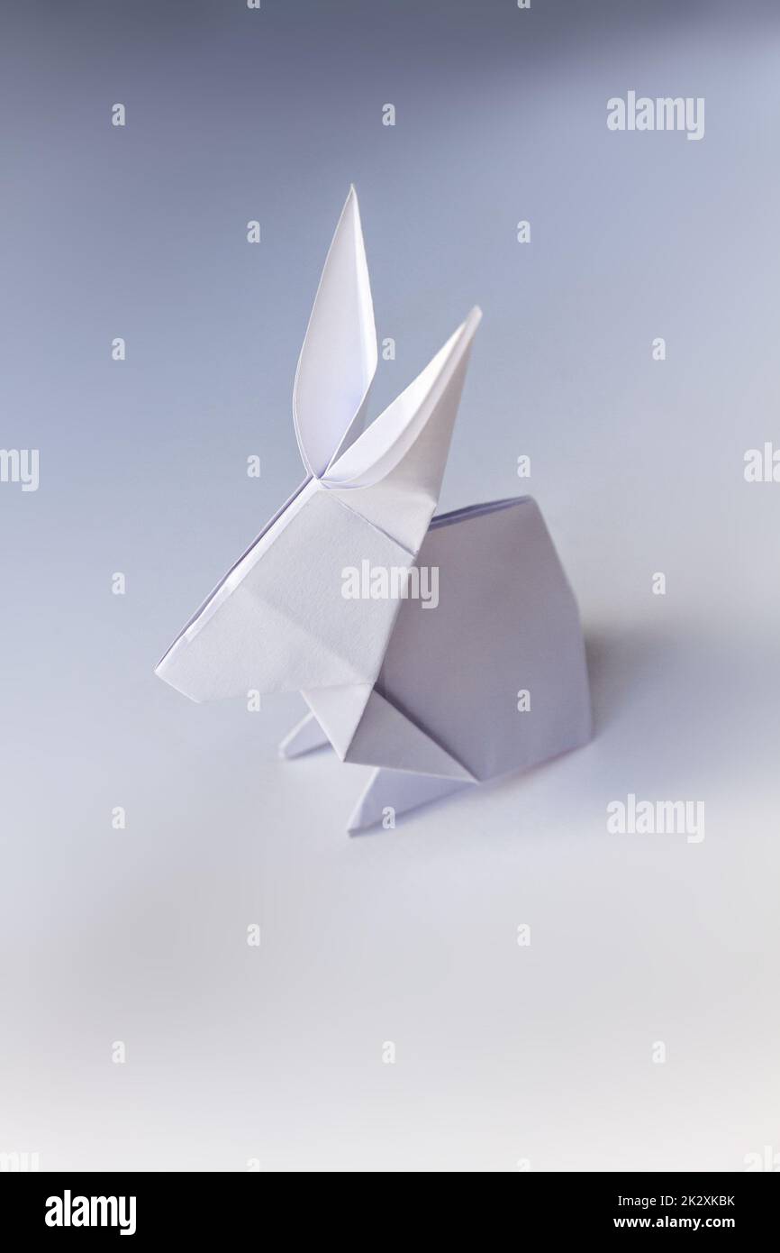 Paper rabbit origami isolated on a white background Stock Photo - Alamy