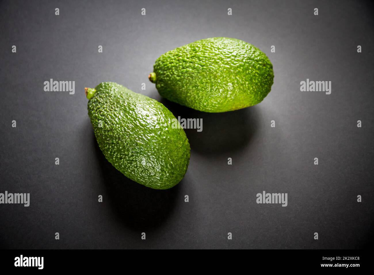 Black avocados hi-res stock photography and images - Alamy