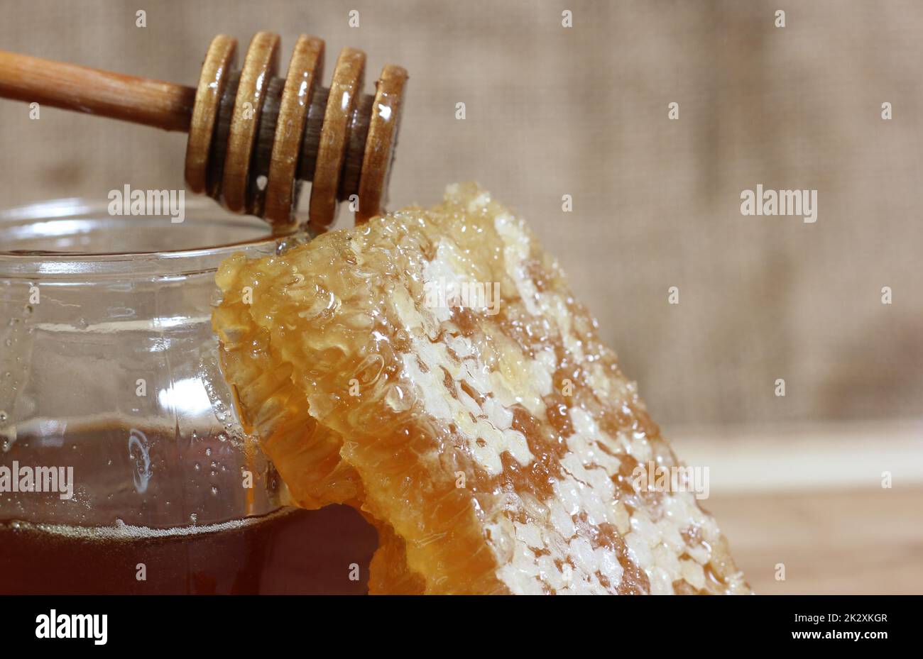 Fresh Honey With Honeycomb and Flowers in Rustic Kitchen Stock Photo ...