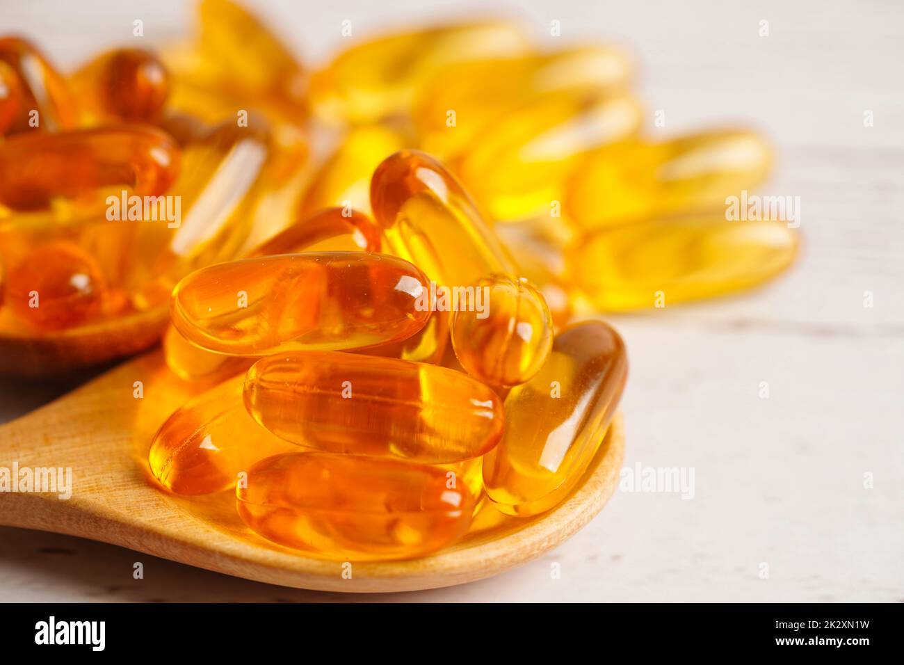 Fish oil or Cod liver oil gel in capsules with omega 3 vitamins ...