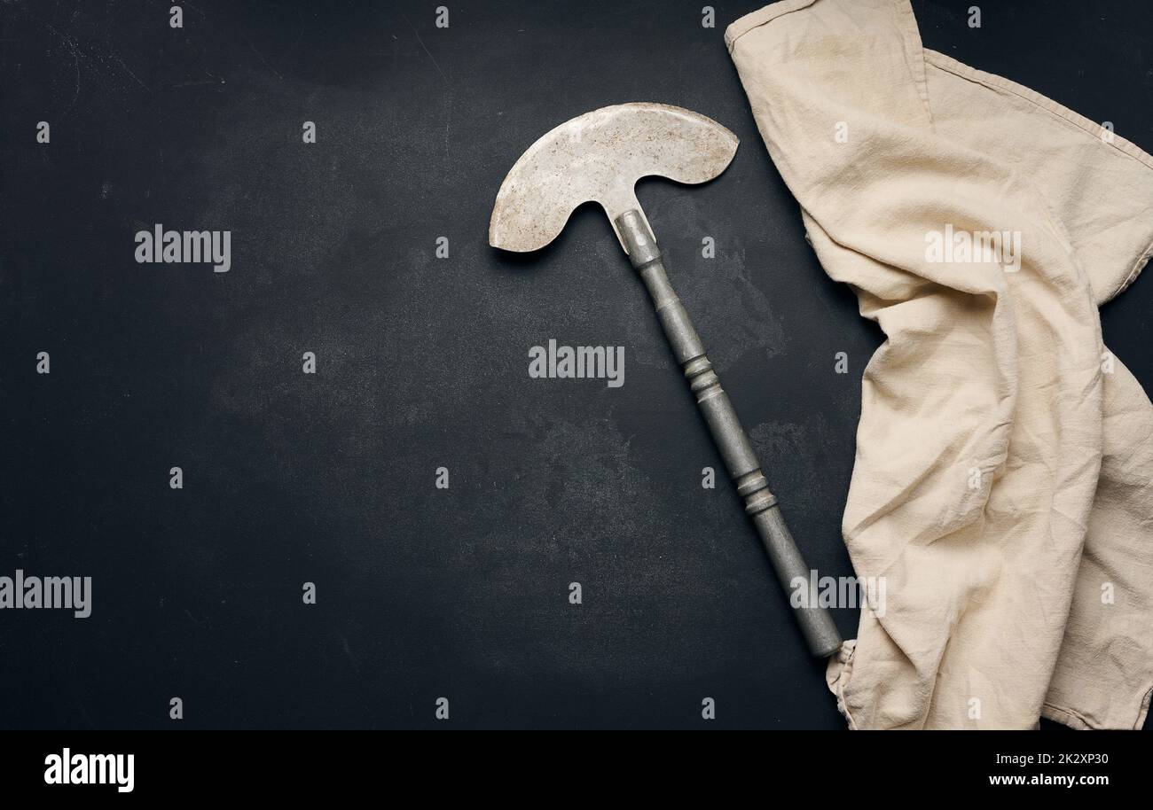 Big kitchen knife on black table with cotton napkin, top view Stock ...